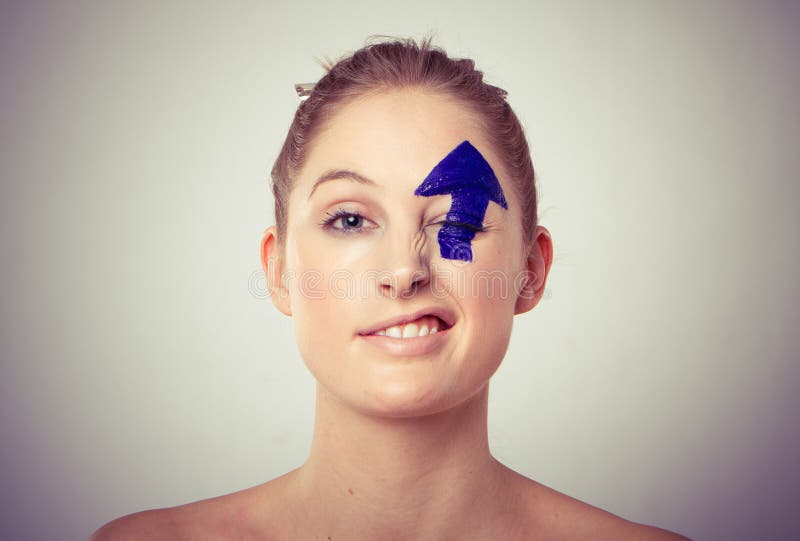 Arrow painted over eye stock photo. Image of closeup - 17482082
