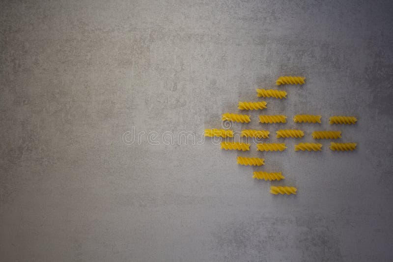 Arrow of Pasta on a Blue Background Stock Image - Image of goal ...