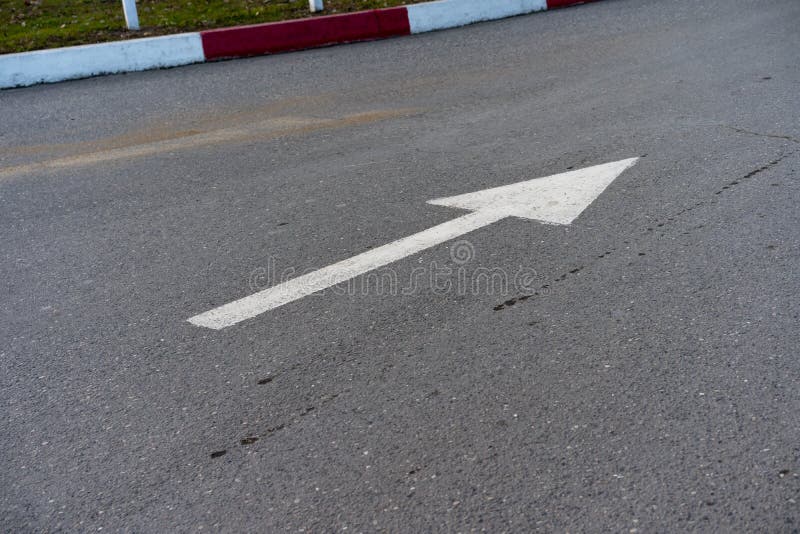 The Arrow on the Pavement Showing the Direction of Movement of Cars ...