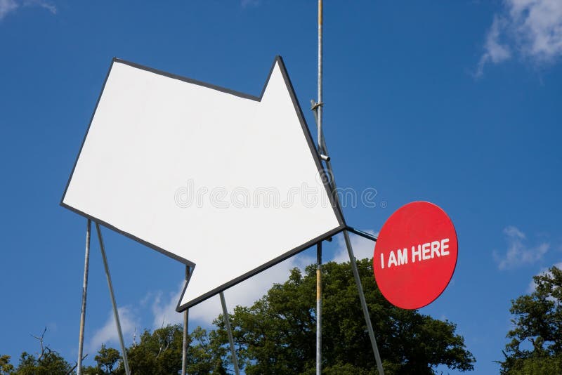 Arrow pointing to sign stock image. Image of guidance - 12592407