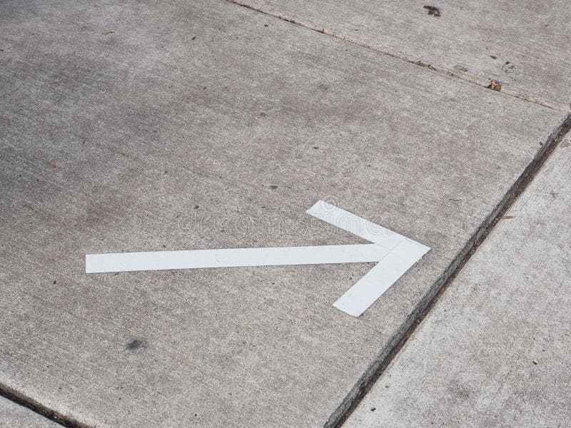 The arrow points the way. stock photo. Image of symbol - 207970132