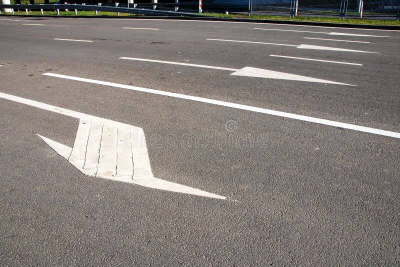Arrow Road Markings on the Asphalt Closeup Stock Image - Image of ...