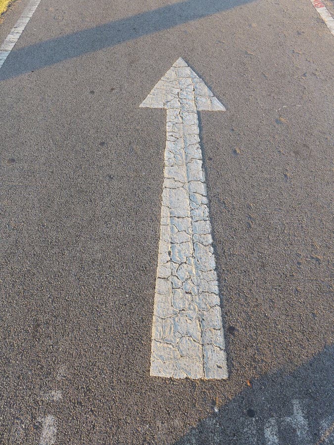 Arrow on road stock image. Image of transportation, gray - 46410887