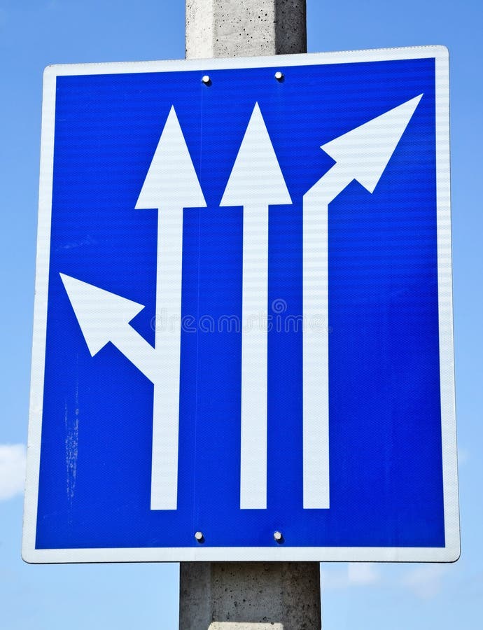 Arrow road sign stock image. Image of sign, pillar, symbol - 61792539