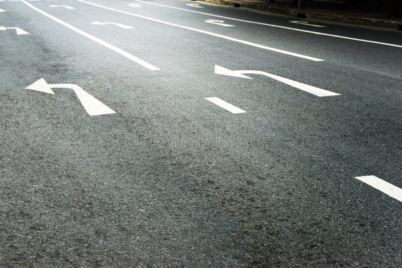 Arrow on the Road and White Color Stock Photo - Image of multiple, rock ...