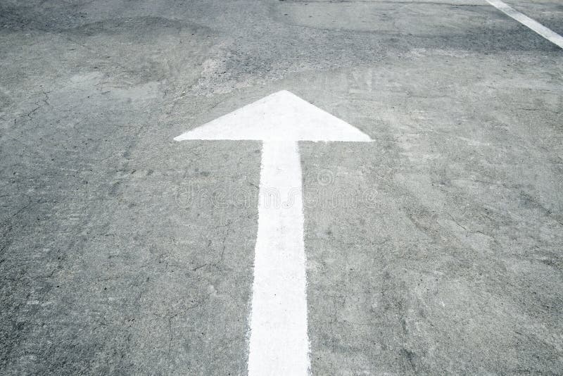 Arrow on the Road and White Color Stock Image - Image of city, pattern ...