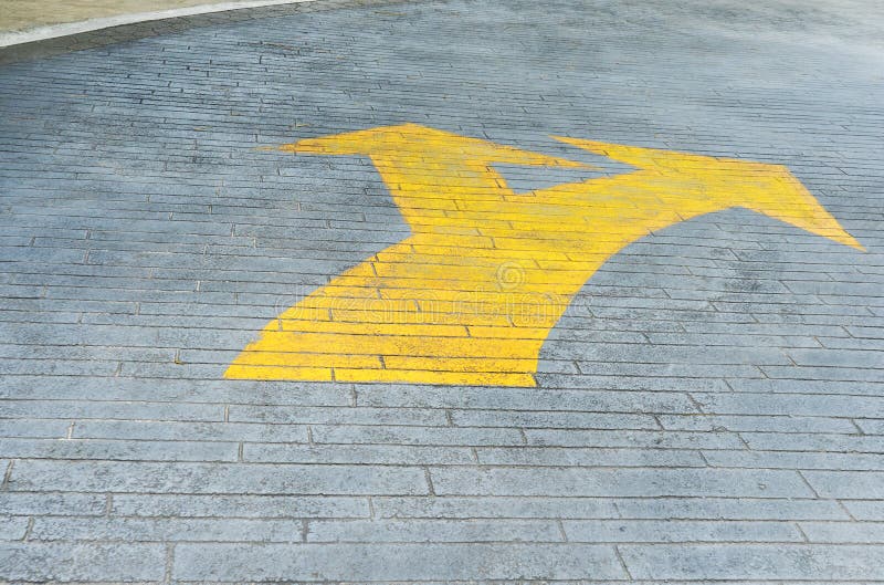Arrow on the Road and Yellow Color Stock Photo - Image of architecture ...