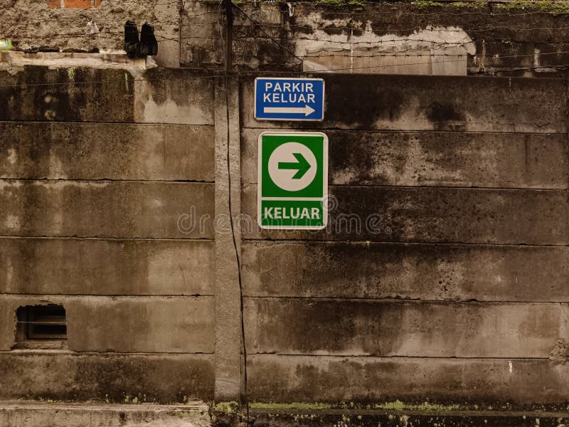 An Arrow Sign for Keluar Which Means Exit Stock Image - Image of exit ...