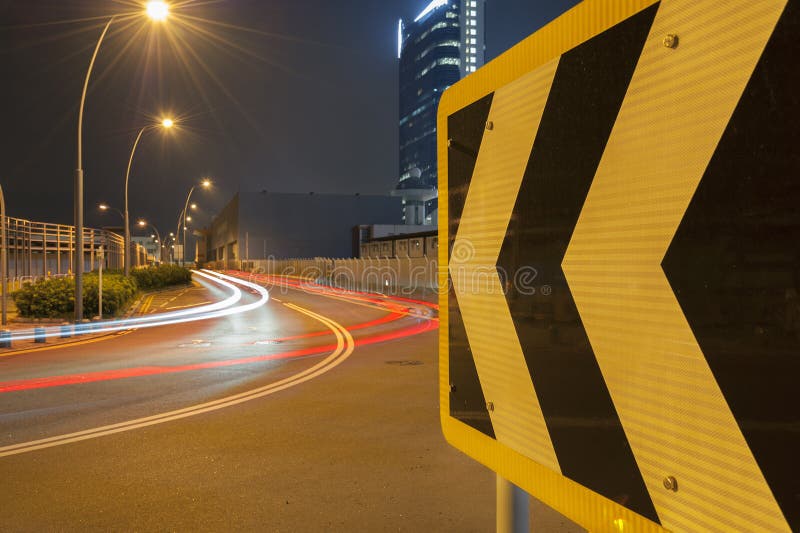 Arrow sign stock photo. Image of night, move, lights - 84230024