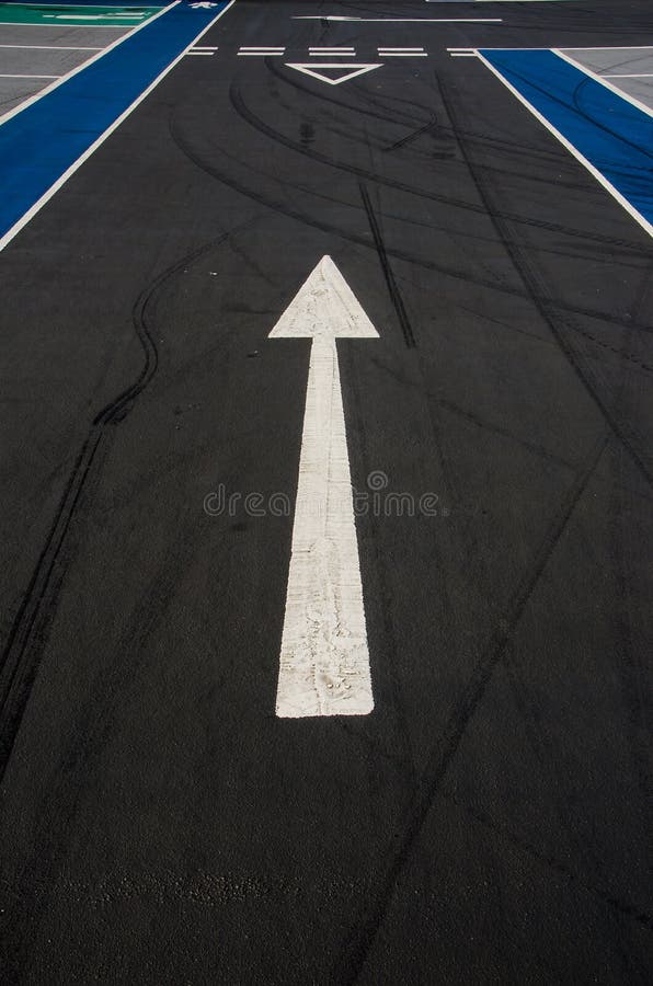 Arrow Sign Pointing Forward Long Empty Straight Road Stock Photos ...