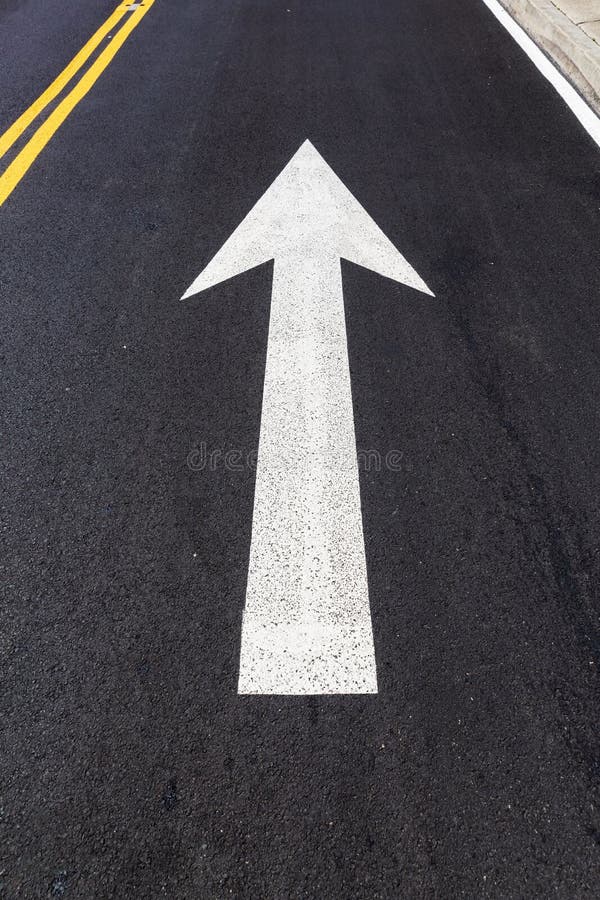 Arrow sign on a road stock image. Image of marking, urban - 168502039