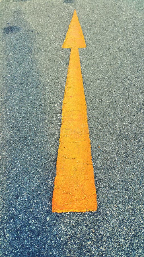 Arrow sign on road/street stock photo. Image of road - 81507190