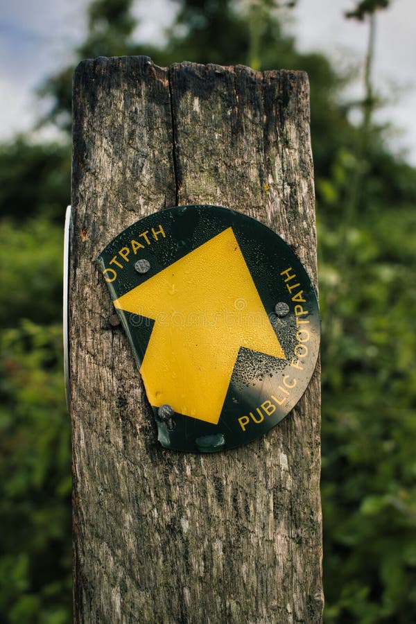 Arrow Sign Sticker with a Message of Public Footpath on a Wooden ...