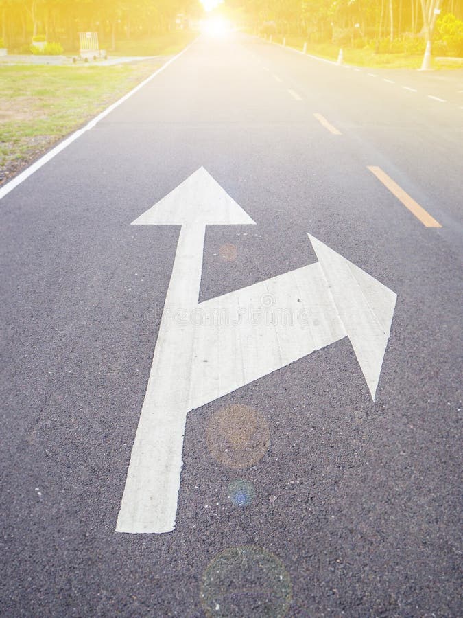 Arrow sign on the street stock image. Image of business - 72710651