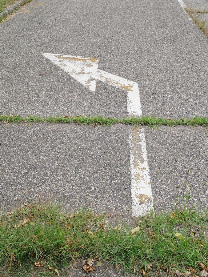 Arrow Sign at the Road Crossing Stock Image - Image of arrow, signal ...