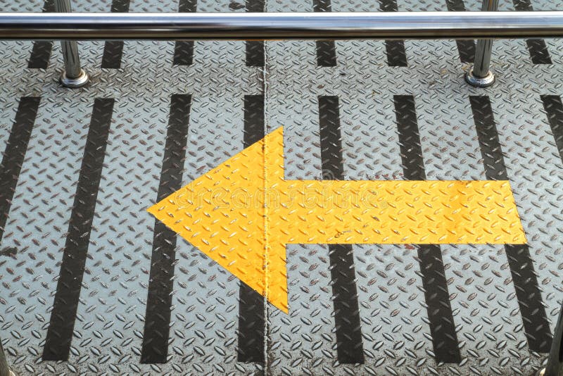 Arrow sign on walking path stock image. Image of direction - 32959359