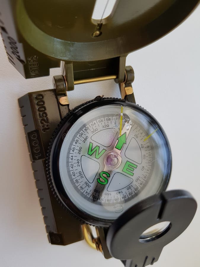 The Compass Needle Points North Stock Photo - Image of city, blue ...