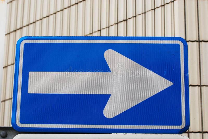 Traffic One Way With An Arrow Sign Showing Which Way To Drive. Stock ...