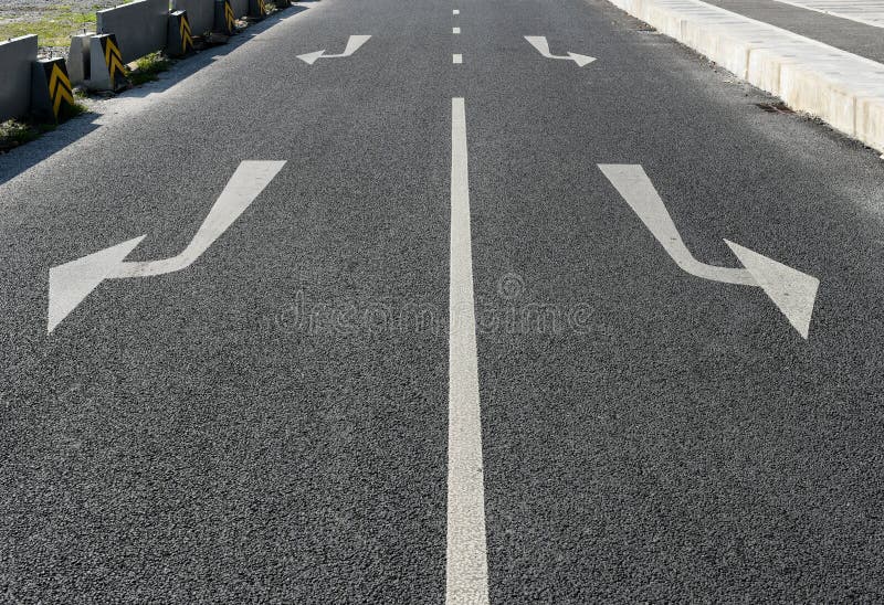 Arrow traffic sign on road stock photo. Image of traffic - 134911950