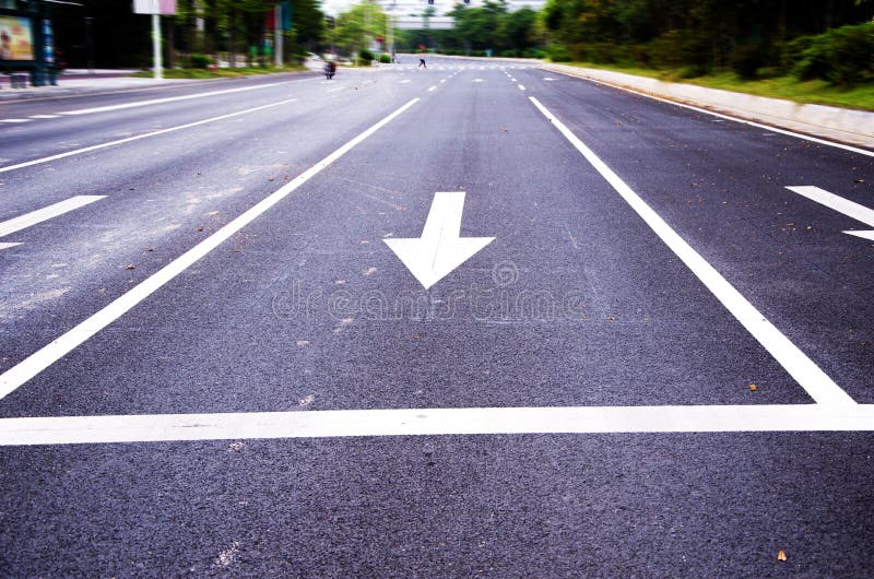 Arrows on the Asphalt To Indicate the Direction of Driving Stock Image ...