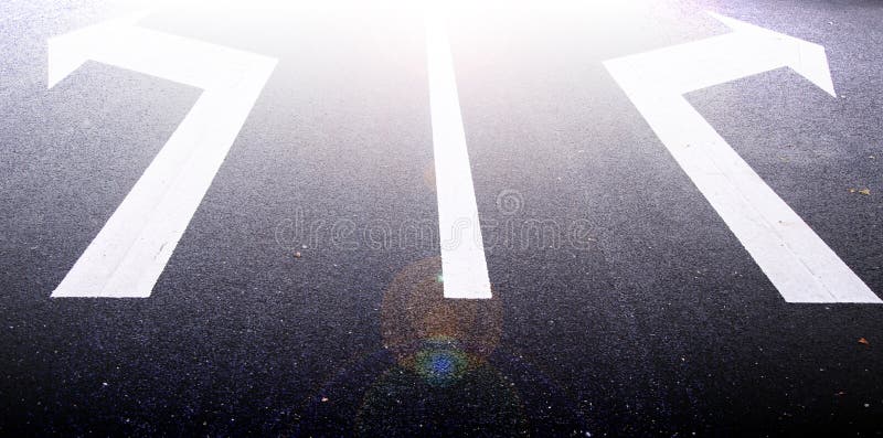 Arrows on the Asphalt To Indicate the Direction of Driving Stock Image ...