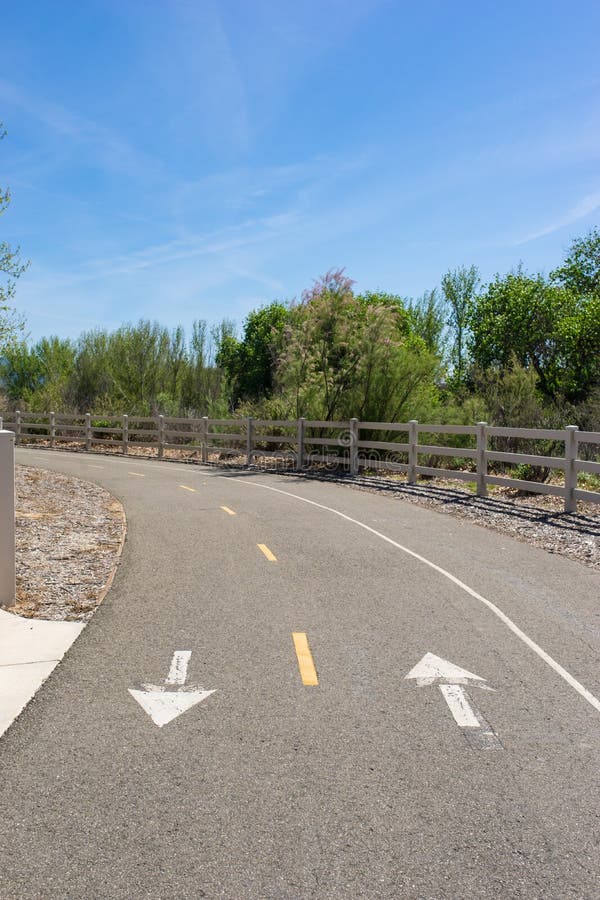 Arrows Point on Trail stock photo. Image of pavement - 68416628