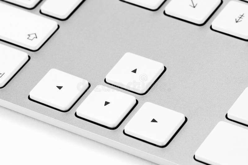 Arrows on a White Aluminum Keyboard Stock Photo - Image of black ...