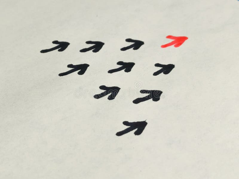 Arrows Written on White Paper. Leadership Concept Stock Image - Image ...