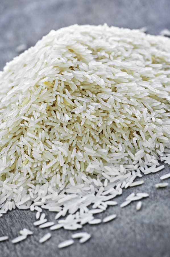 Arroz De Grano Largo En Saco De La Arpillera Foto de archivo - Imagen ...