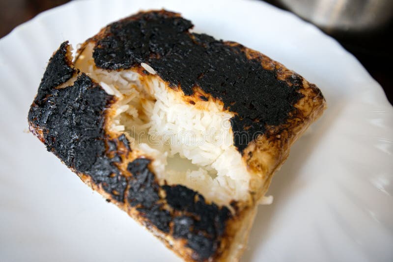 Arroz Totalmente Quemado En La Placa Foto de archivo - Imagen de error ...