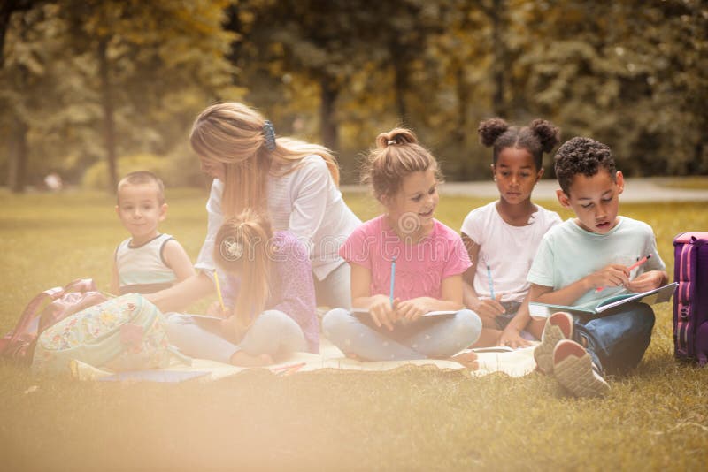 Art class at nature. stock image. Image of males, happiness - 121918961
