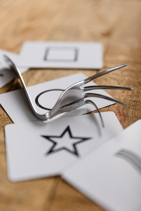 Art of Fork Bending, How To Bend Forks with Your Mind Stock Image ...