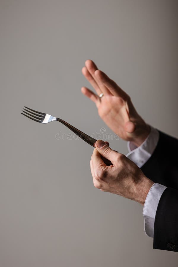 Art of Fork Bending, How To Bend Forks with Your Mind Stock Image ...