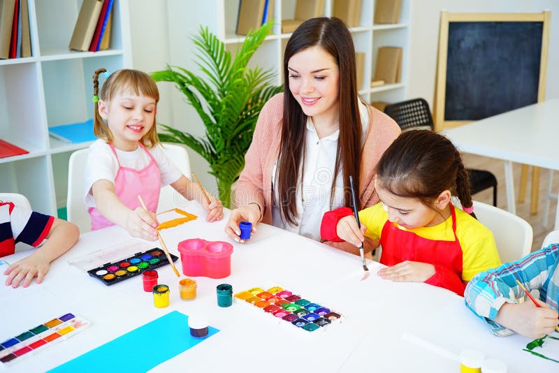Art Lesson in Elementary School Stock Photo - Image of painter, artist ...