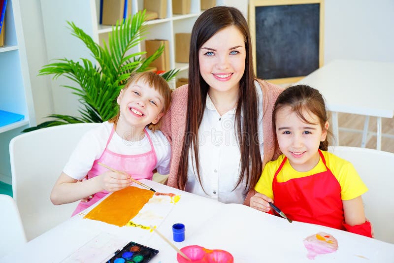 Art Lesson in Elementary School Stock Photo - Image of club, girl: 91610870