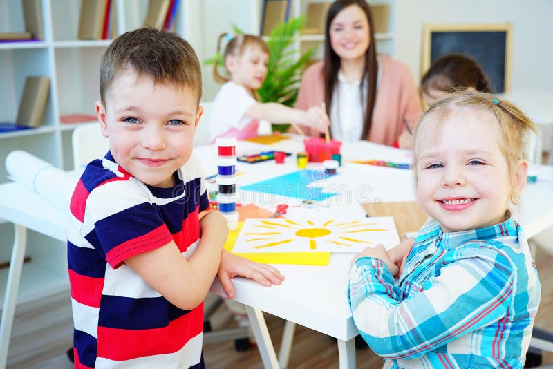Art lesson in kindergarten stock photo. Image of interior - 91610732