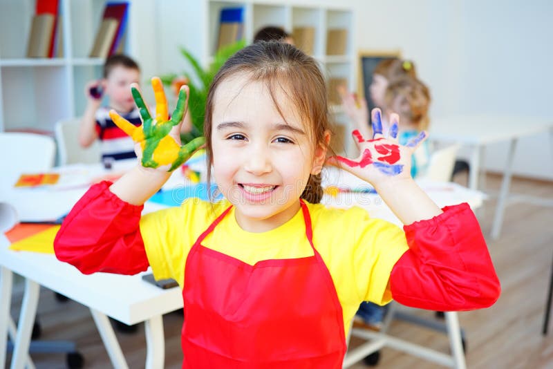 Art lesson in kindergarten stock image. Image of interior - 91807533