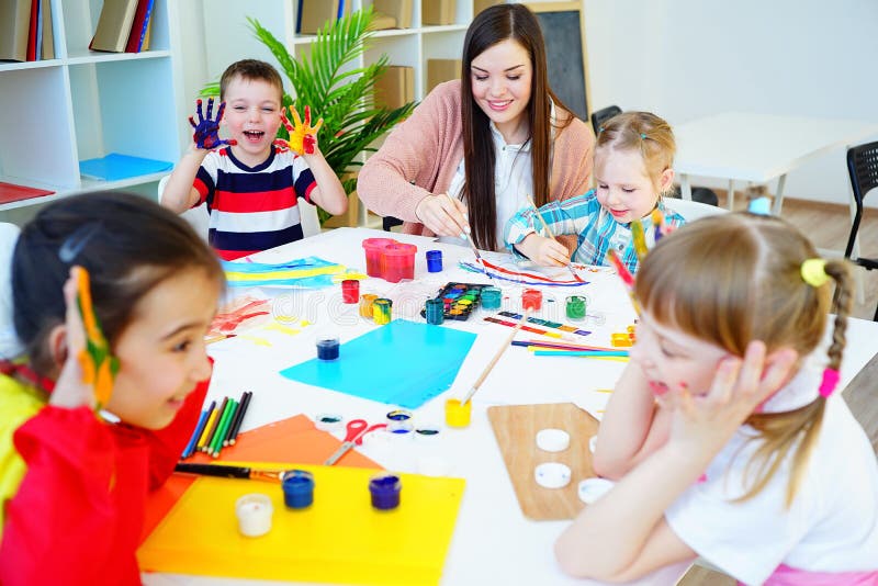 Art lesson in kindergarten stock image. Image of group - 91807685