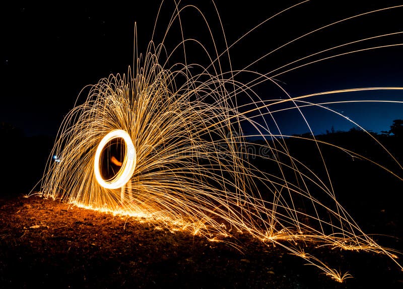 Art light of fire spinning stock image. Image of burn - 69287819