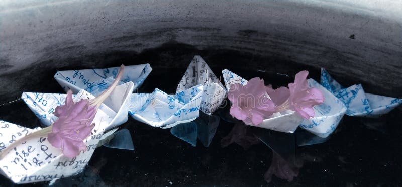 Art of Paper Boat, on Water with Some Flowers Stock Image - Image of ...