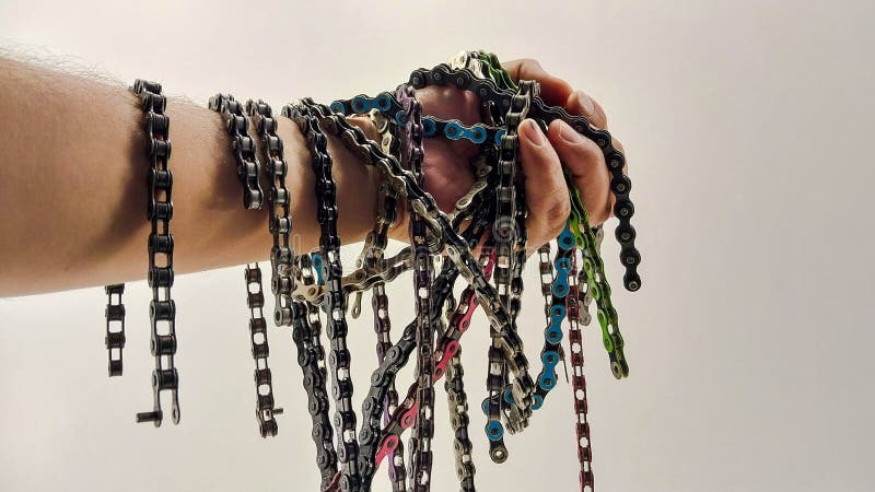 Art Photo with Colored Bicycle Chains in Man S Hand Stock Photo - Image ...