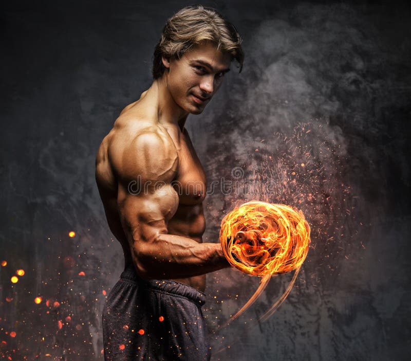 Portrait of a Man with Burning Dumbbell. Stock Image - Image of ...