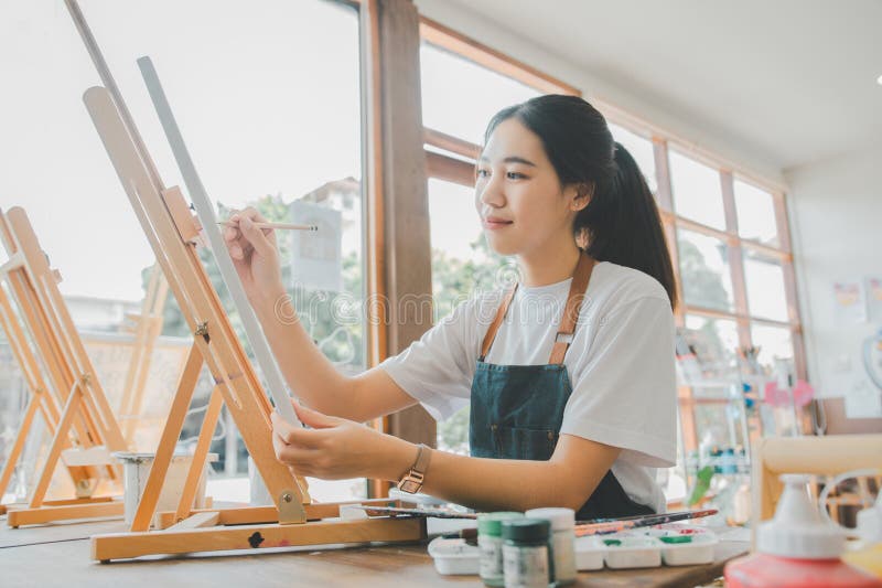 Art Student Drawing with Watercolor Painting on Canvas Doing Some Art ...