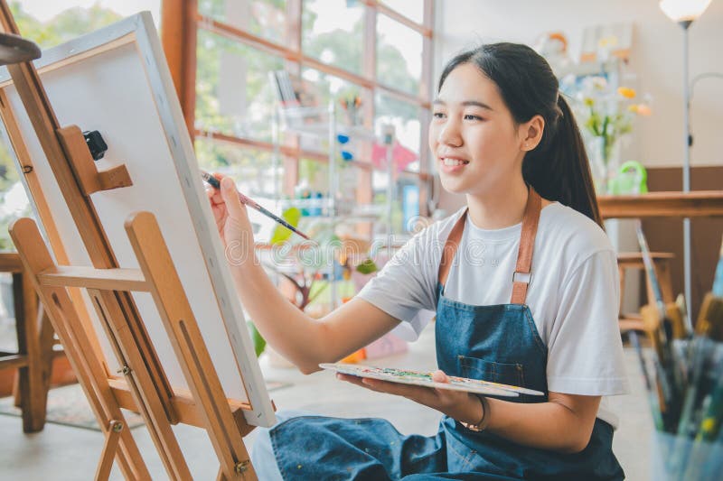 Art Student Drawing with Watercolor Painting on Canvas Doing Some Art ...