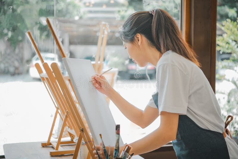 Art Student Drawing with Watercolor Painting on Canvas Doing Some Art ...