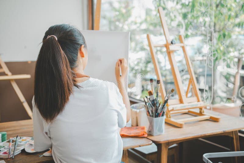 Art Student Drawing with Watercolor Painting on Canvas Doing Some Art Projects on Studio ...