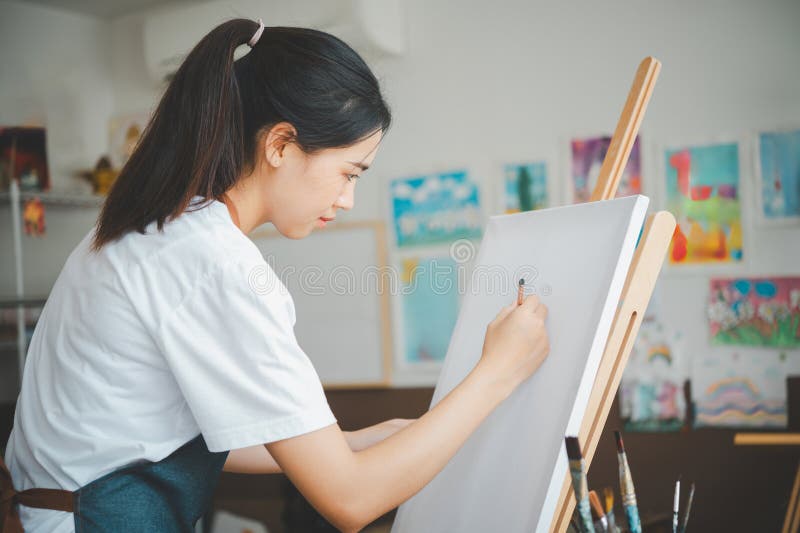 Art Student Drawing with Watercolor Painting on Canvas Doing Some Art ...