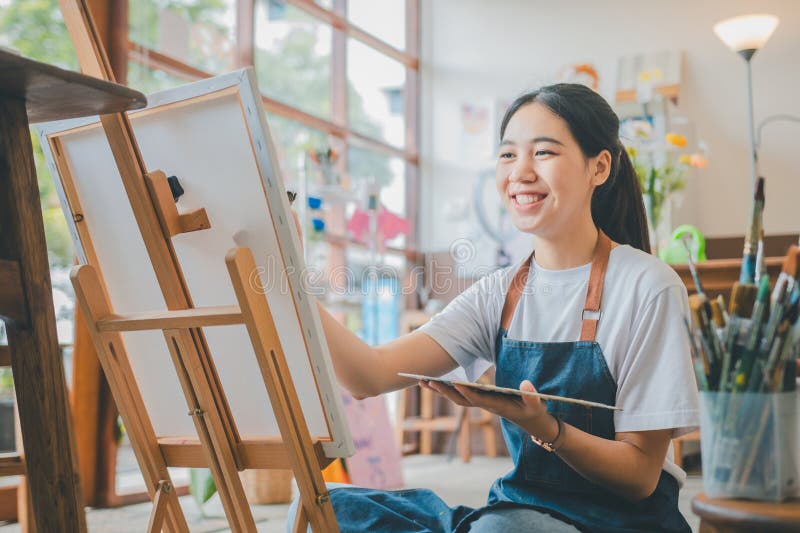 Art Student Drawing with Watercolor Painting on Canvas Doing Some Art ...
