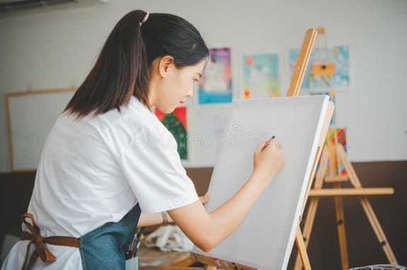 Art Student Drawing with Watercolor Painting on Canvas Doing Some Art ...