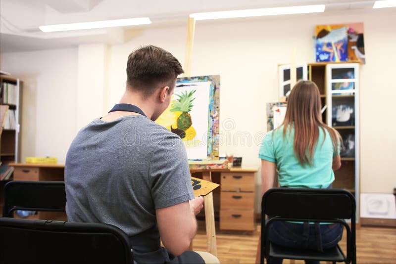 Art Students Painting in Workshop Stock Image - Image of canvas, artist ...